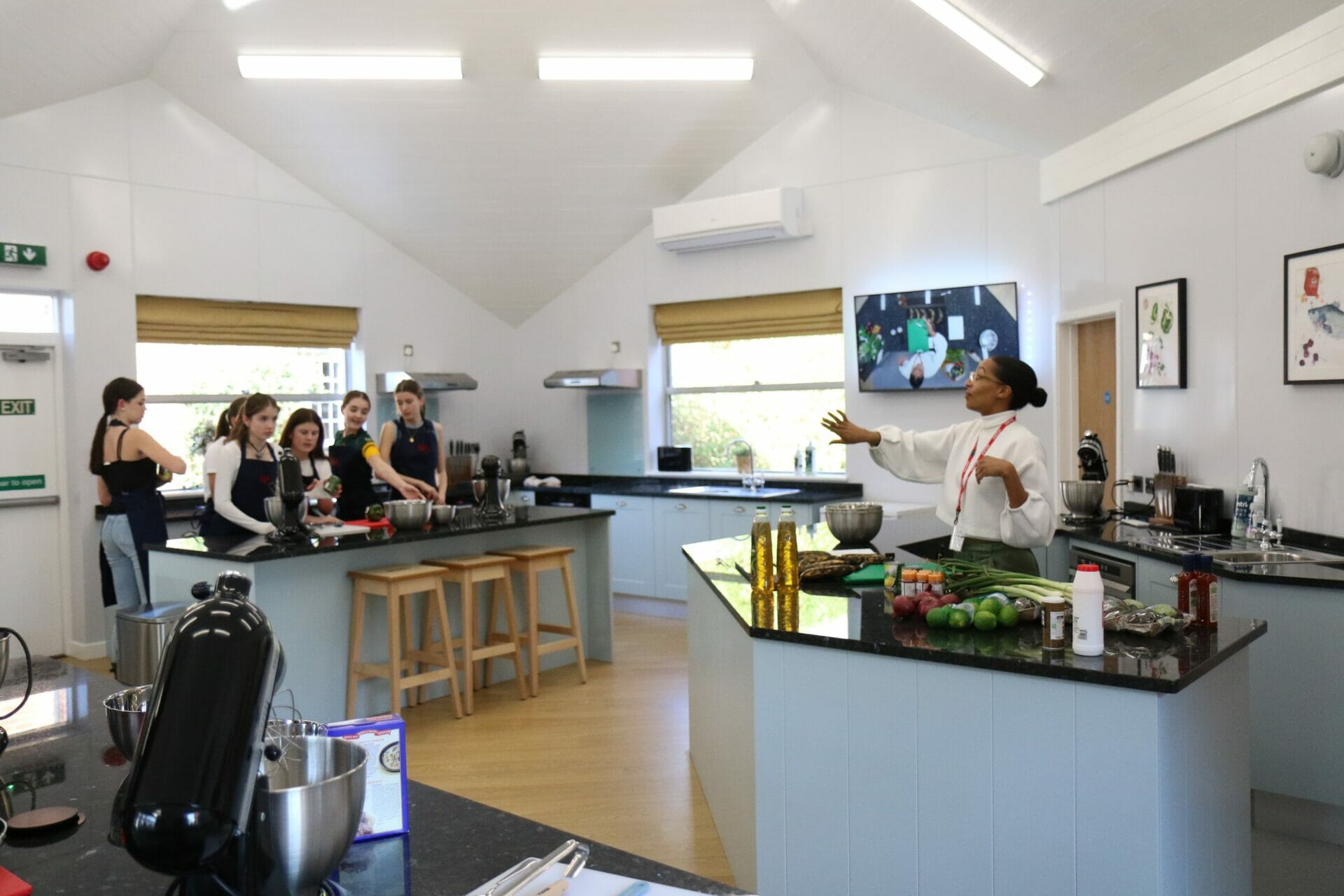 Queen Anne’s alumna Afiya Titus unveils school’s new culinary ...