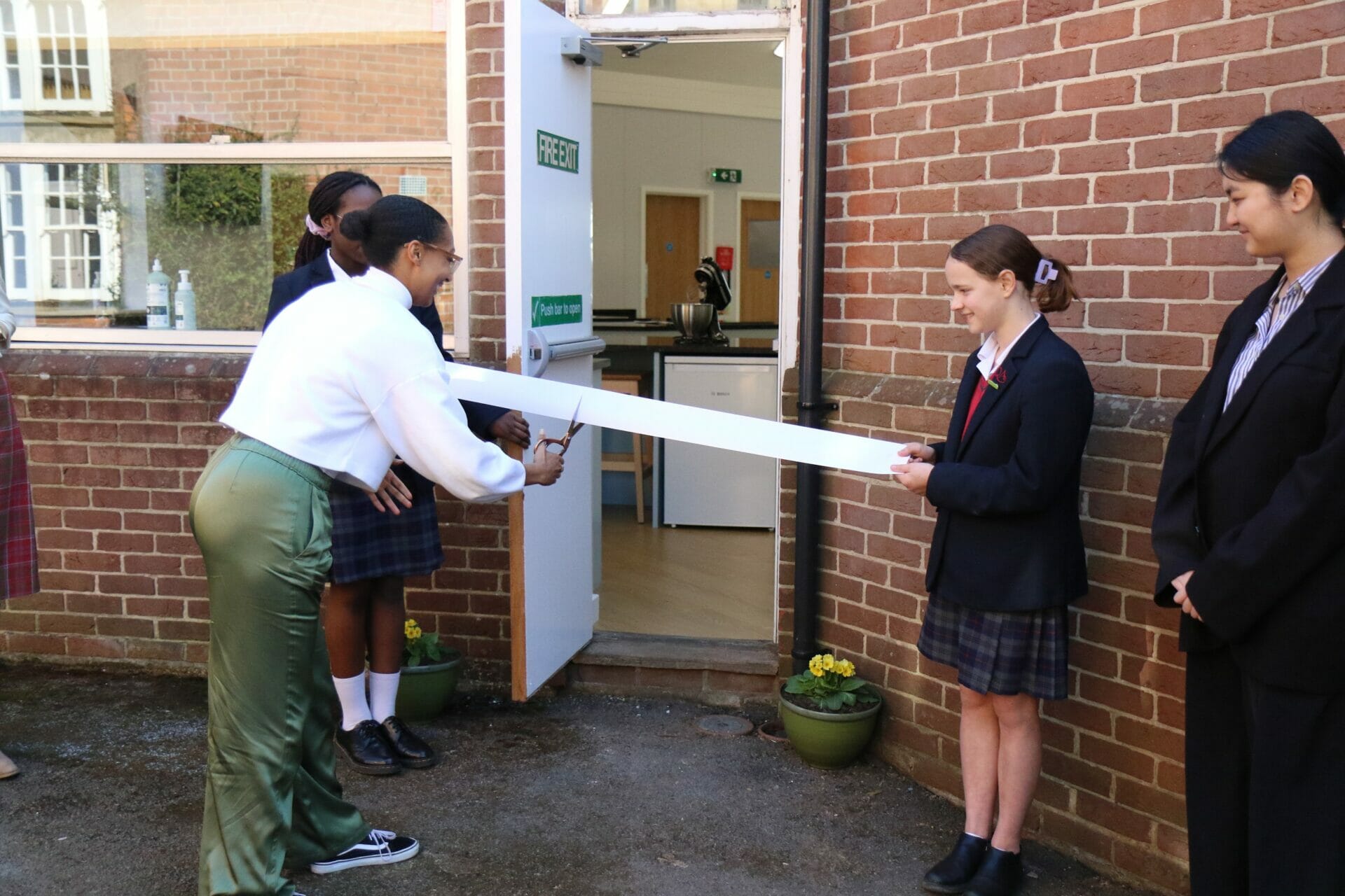 Queen Anne’s alumna Afiya Titus unveils school’s new culinary ...